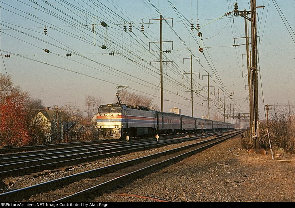 Amtrak E-60 950 with a dozen cars
